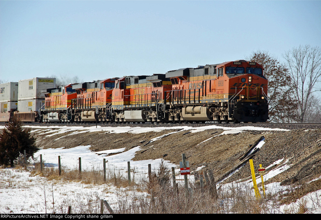 BNSF 6908 Leads a Slow moving stack EB.